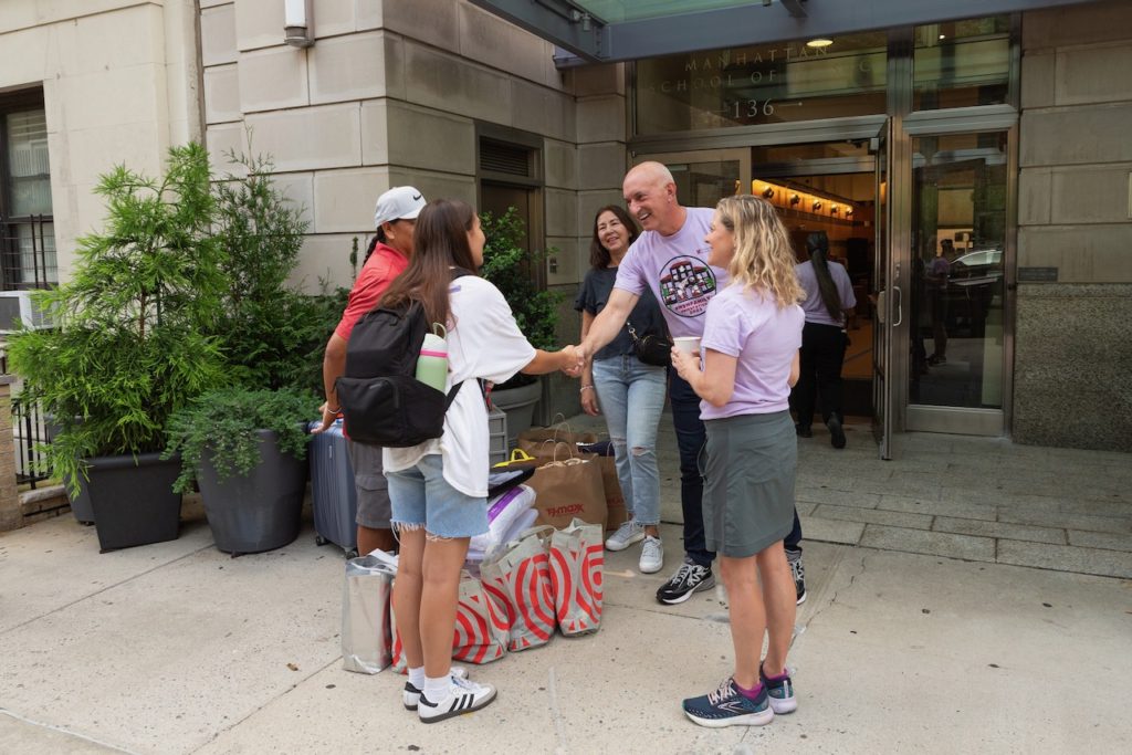 incoming students move in day 2023 greeted by Jim Gandre and Joyce ...